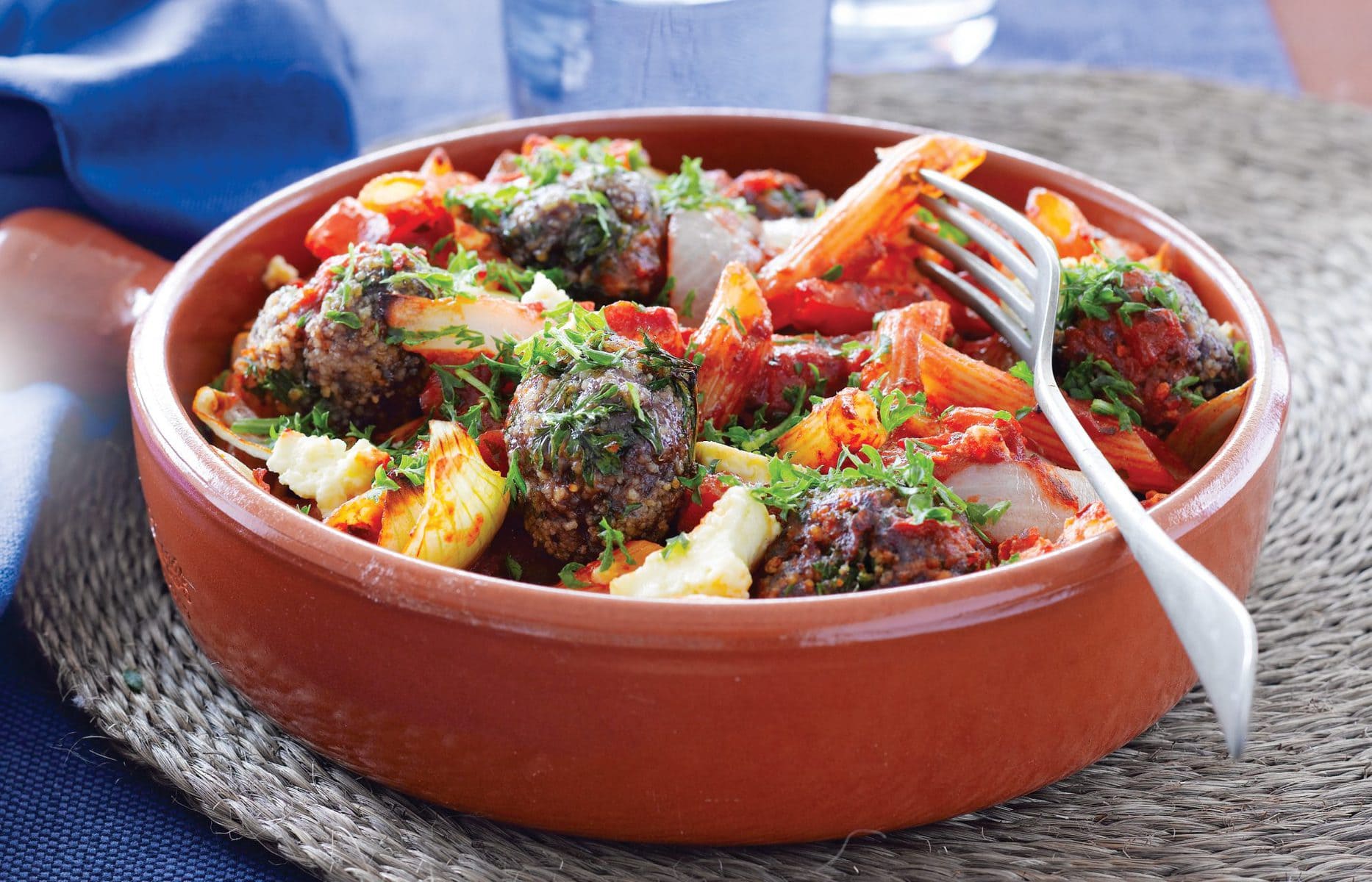 Greek-style meatball tray bake - Healthy Food Guide