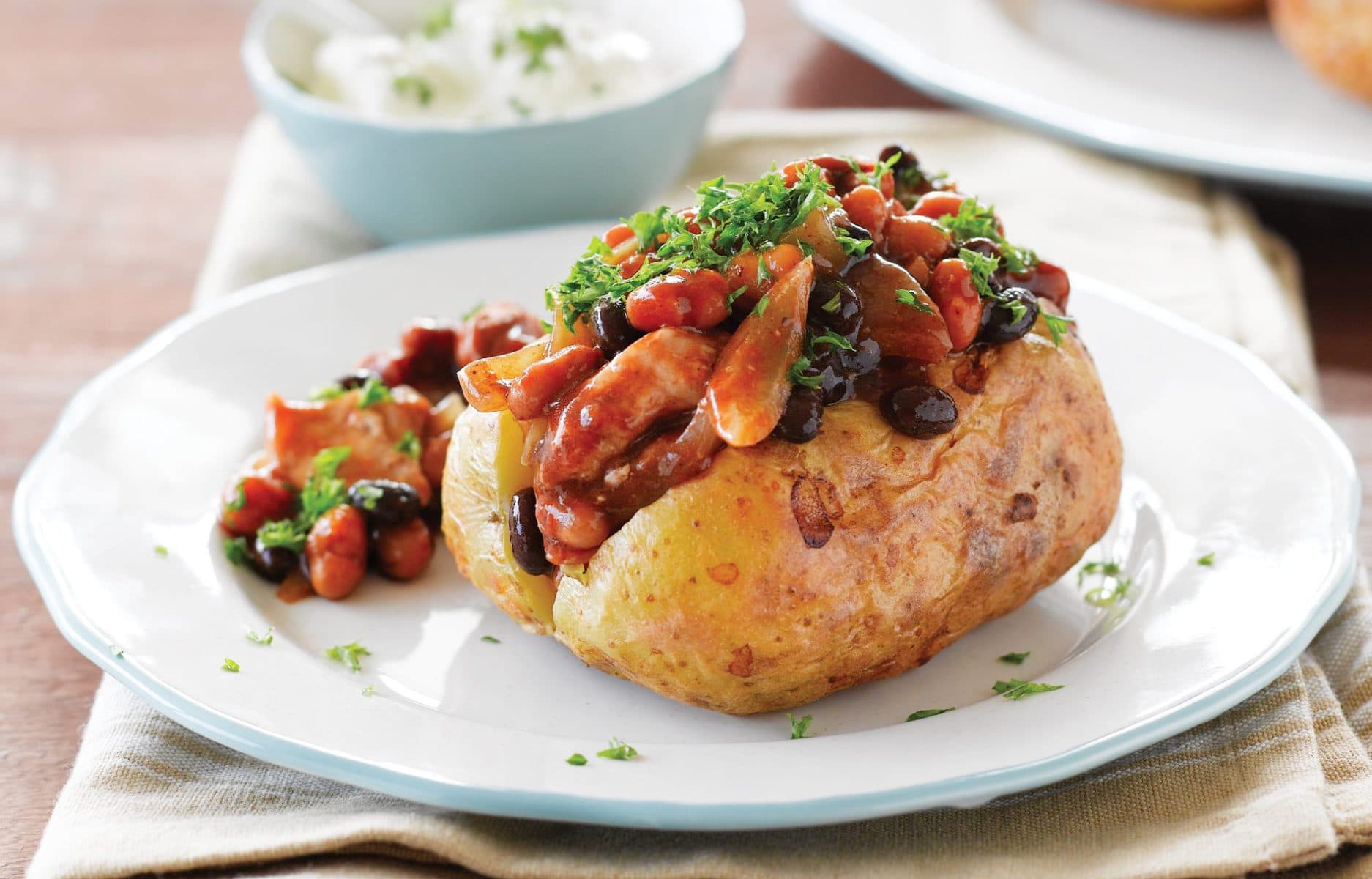 Pork and bean jacket potatoes - Healthy Food Guide