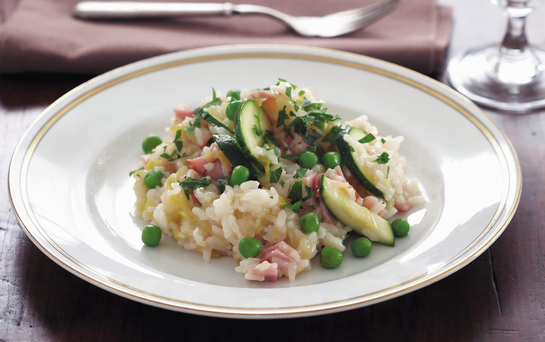 Oven-baked courgette, ham and pea risotto - Healthy Food Guide