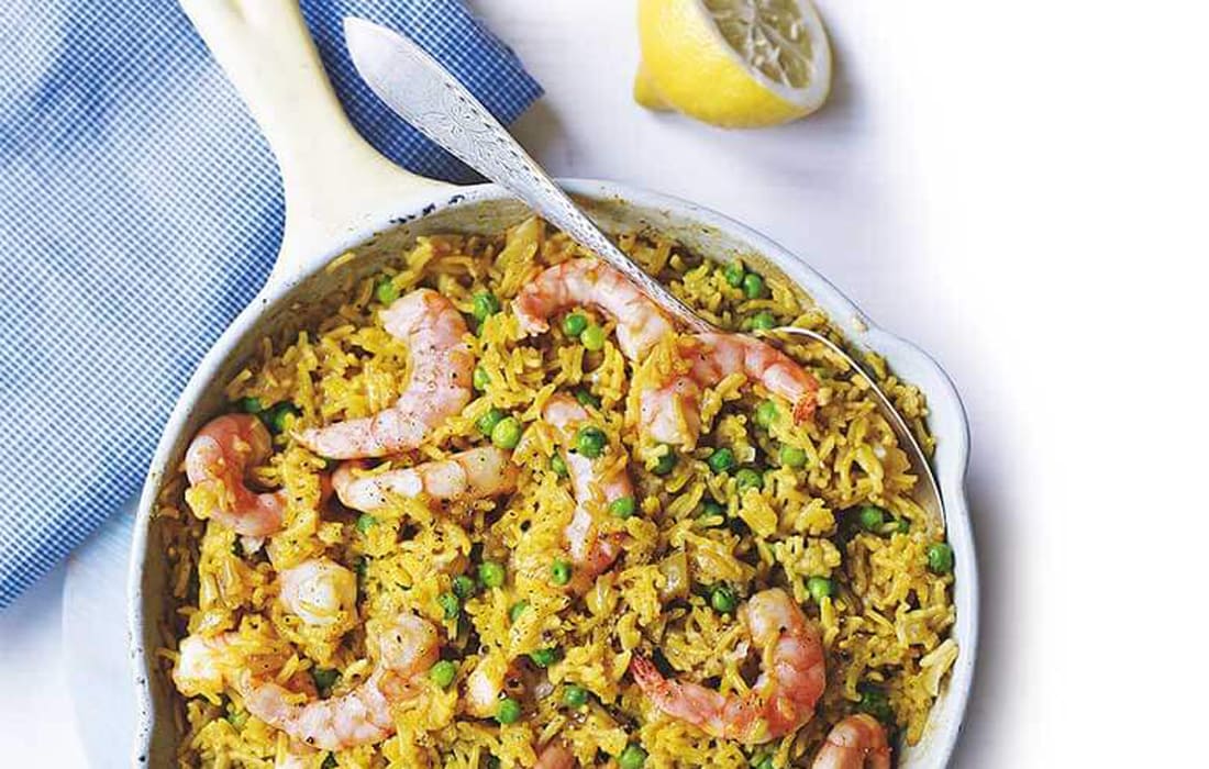 Spiced prawn and pea pilaf - Healthy Food Guide