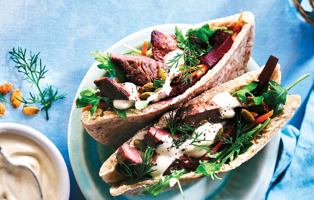 Pita pockets with seared beef and beetroot and pumpkin seed salad ...