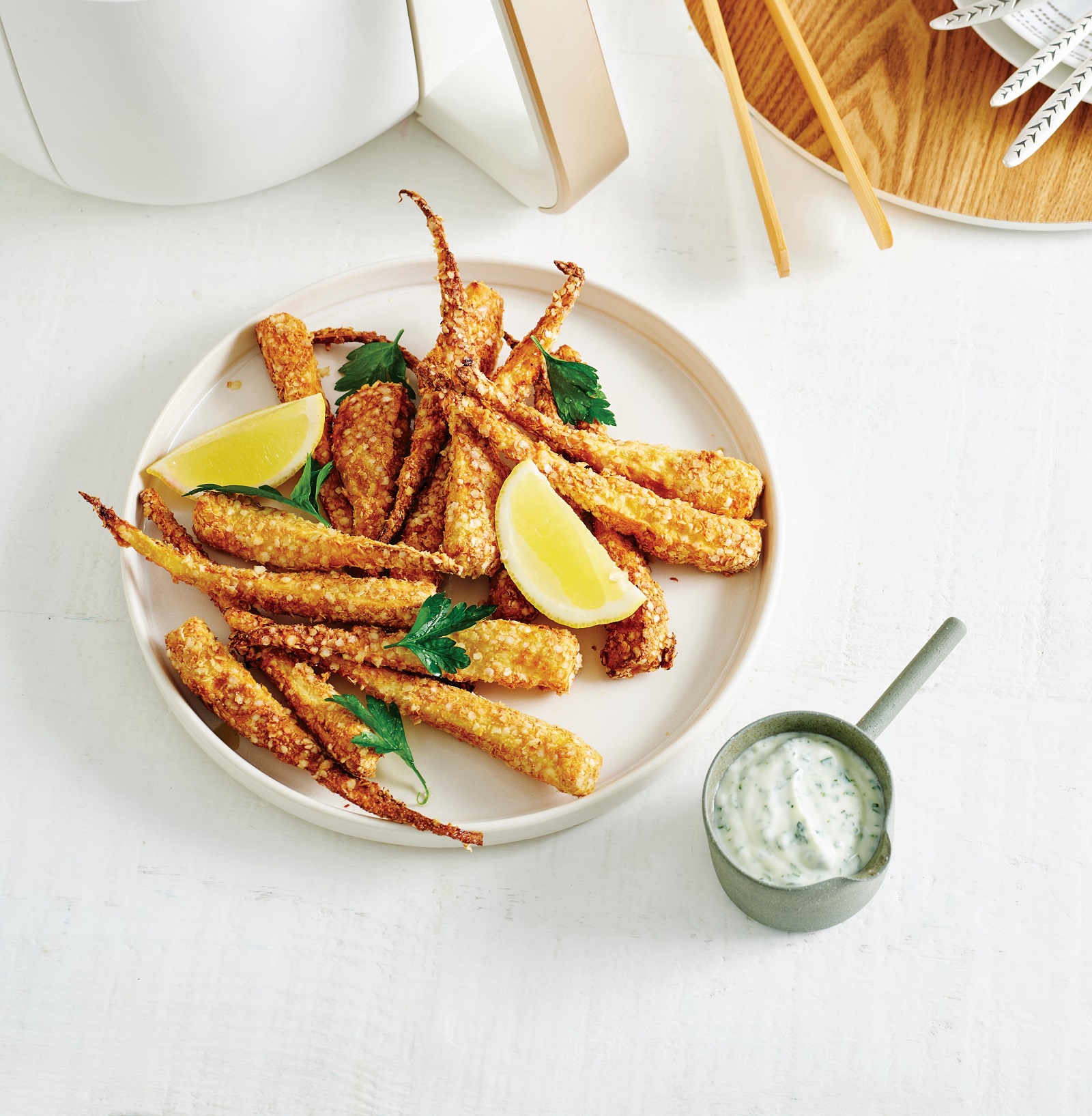 Crispy parsnip chips with lemon yoghurt parsley sauce - Healthy Food Guide