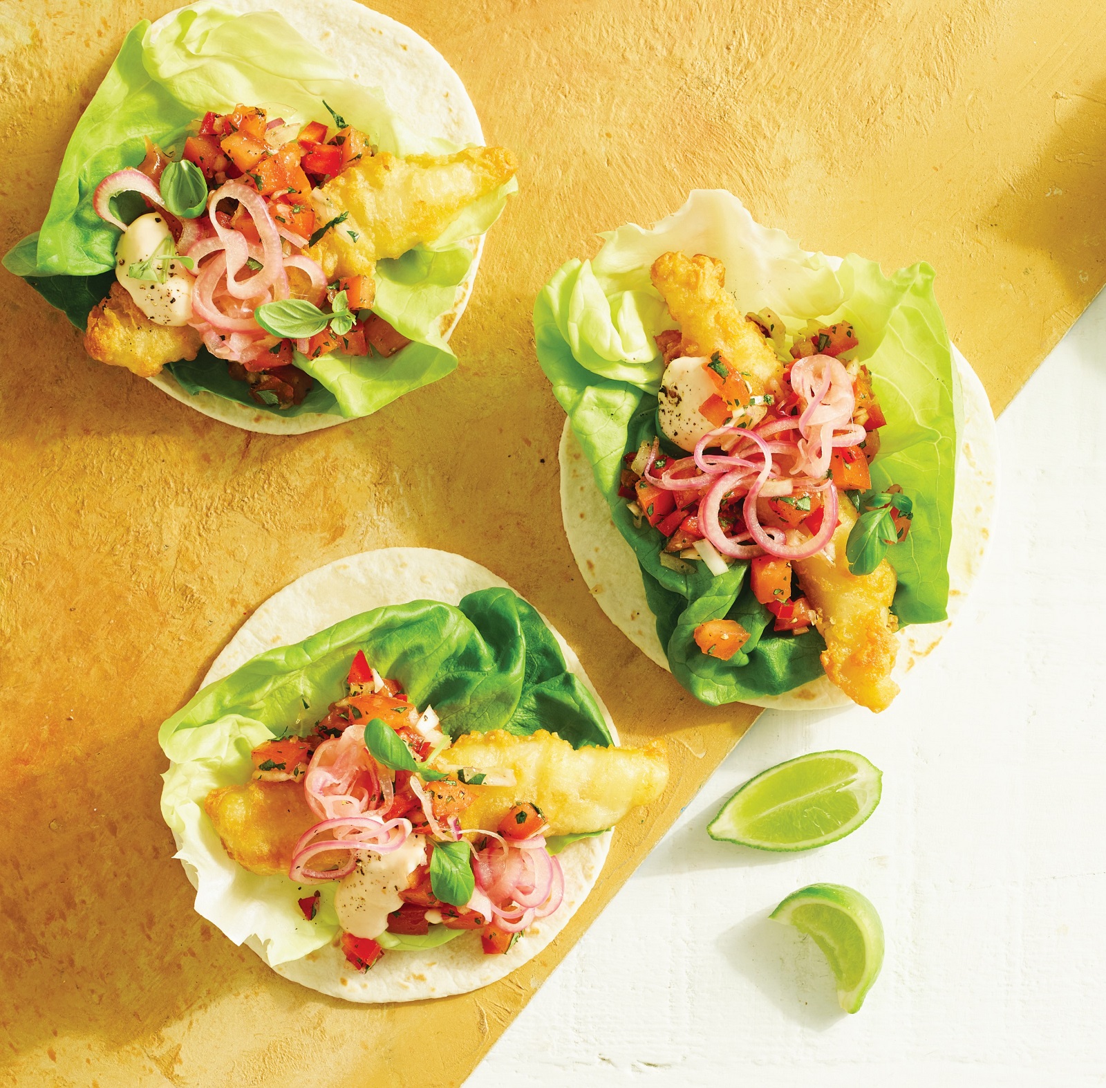 Fish tacos with pink pickled onions and tomato salsa - Healthy Food Guide